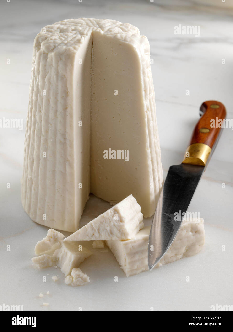 Whole Italian Ricotta cheese on a marble background Stock Photo - Alamy