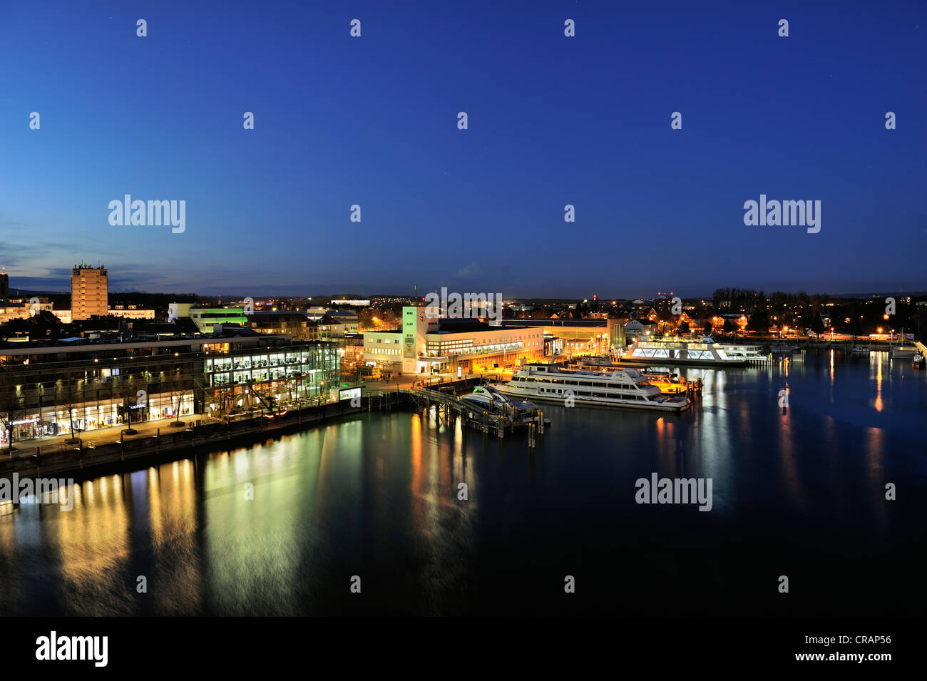 The ferry port with the Zeppelin Museum, on the left the Medienhaus ...
