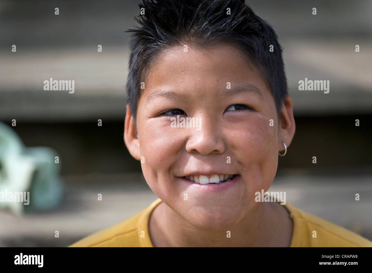Inuit boy, Inuit settlement of Tiniteqilaaq, Sermilik Fjord, East ...