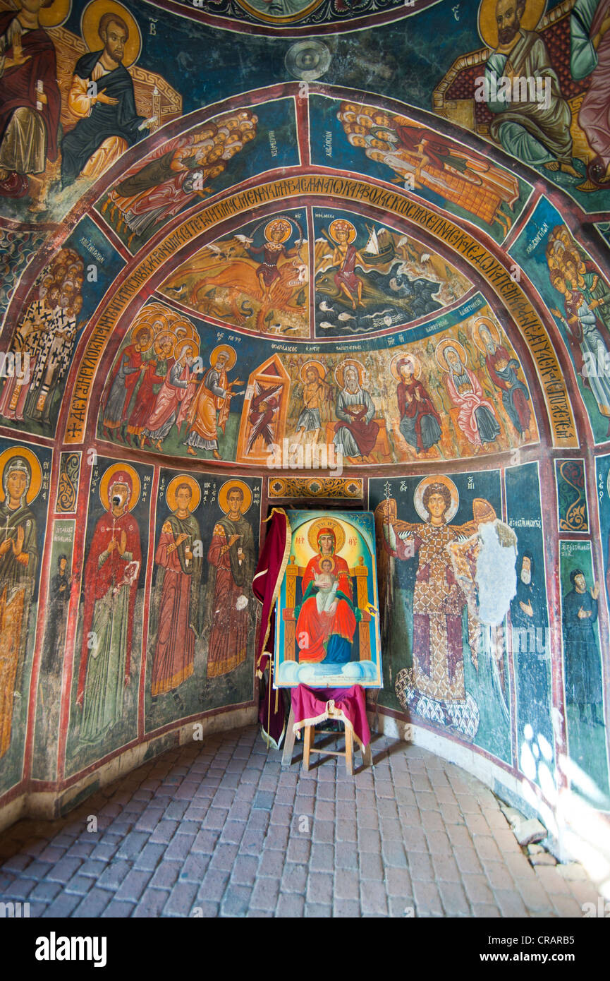 Byzantine frescoes in a painted barn-roofed Greek Orthodox church ...