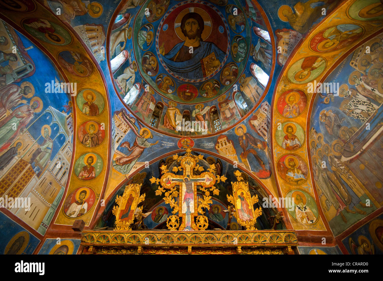 Byzantine frescoes in a painted barn-roofed Greek Orthodox church ...