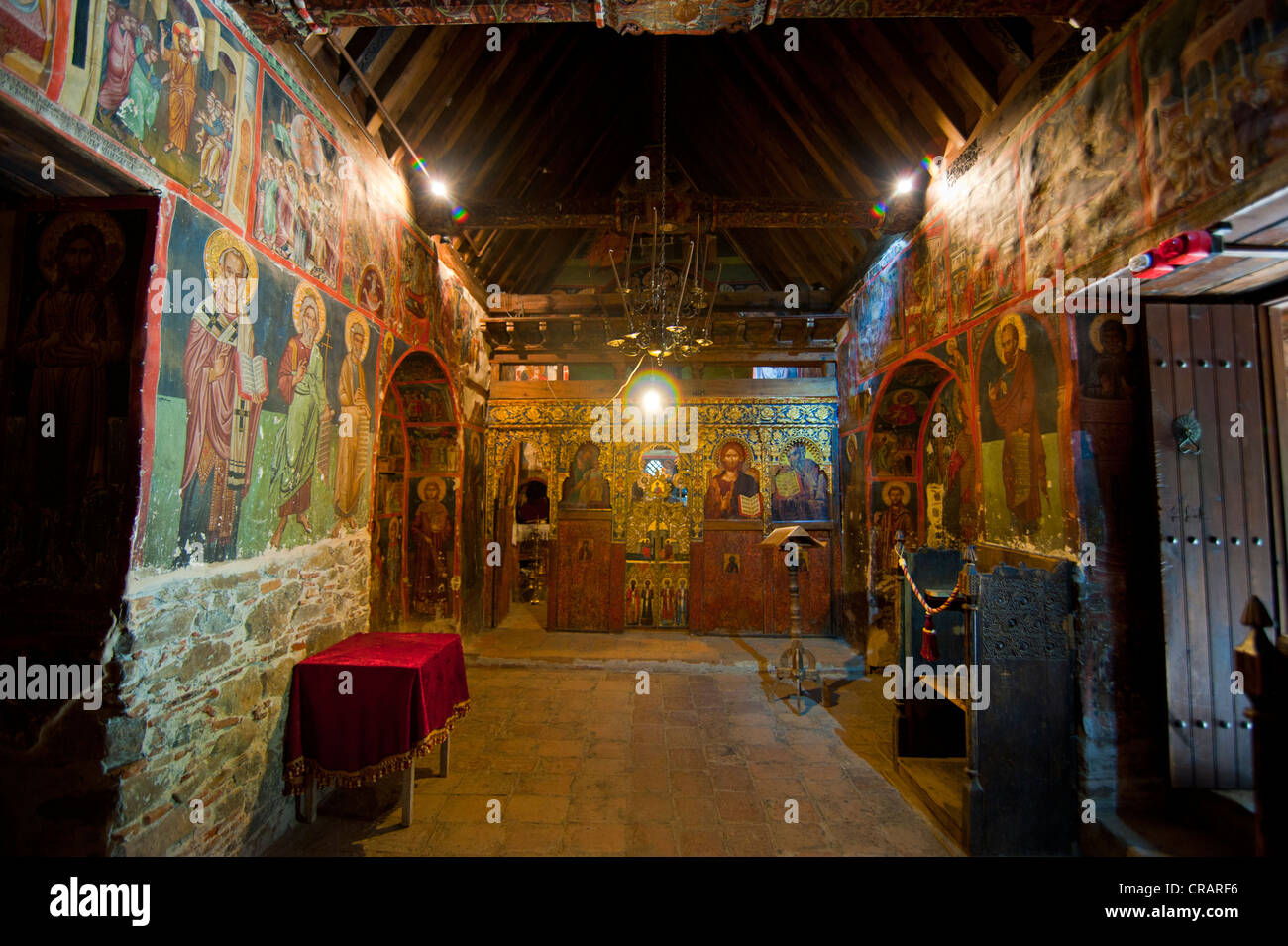 Byzantine frescoes in a painted barn-roofed Greek Orthodox church ...