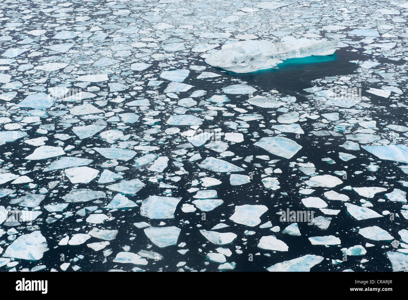 Ice floes and an iceberg near Kulusuk, East Greenland, Greenland Stock ...