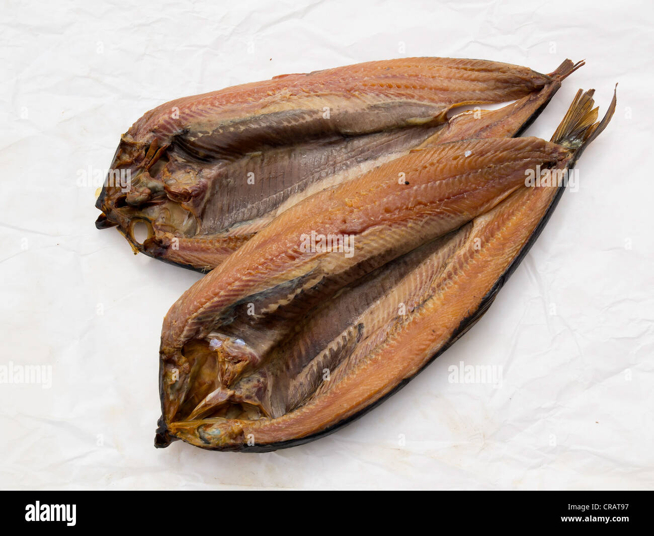 A pair of traditional oak smoked kippers Stock Photo - Alamy