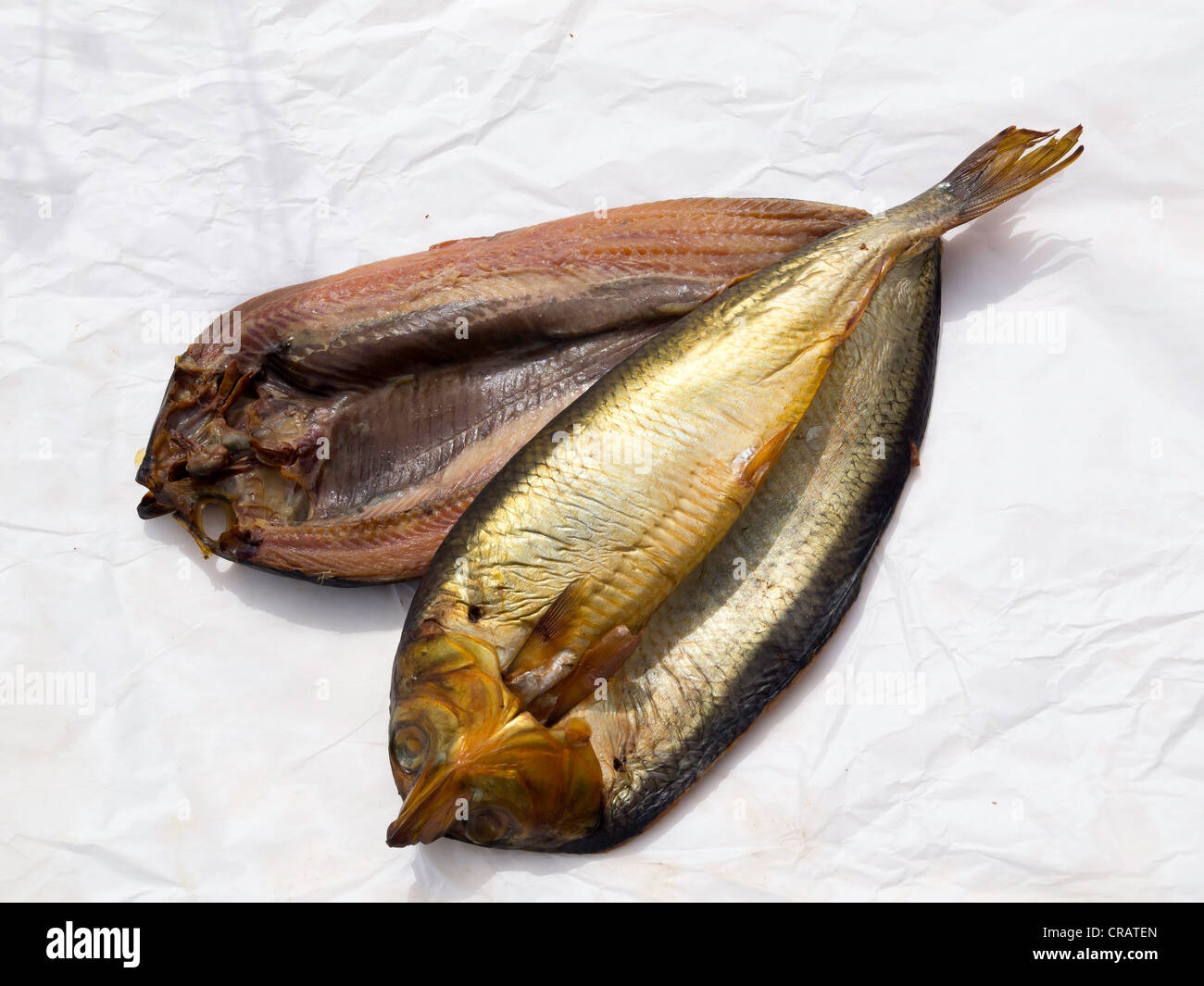 A pair of traditional oak smoked kippers Stock Photo - Alamy