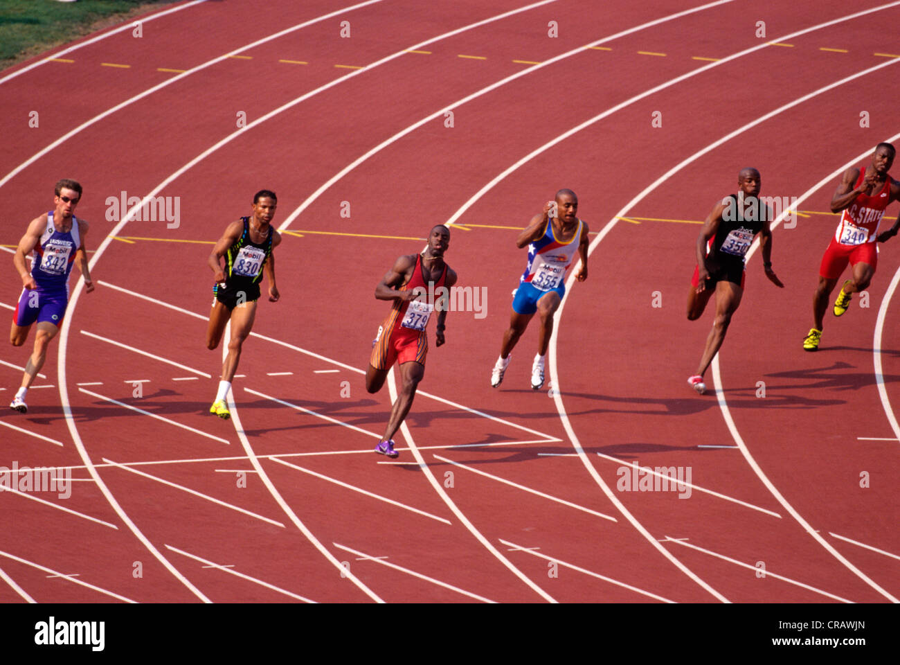Males running on track hi-res stock photography and images - Alamy