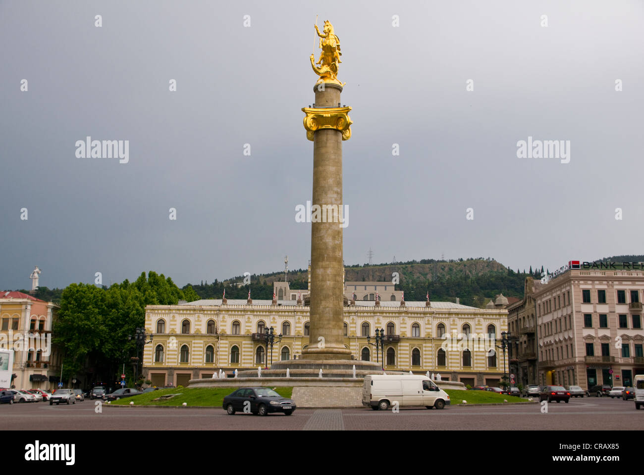Obelisk with a golden statue on its top, Tbilisi, Georgia, Middle East ...