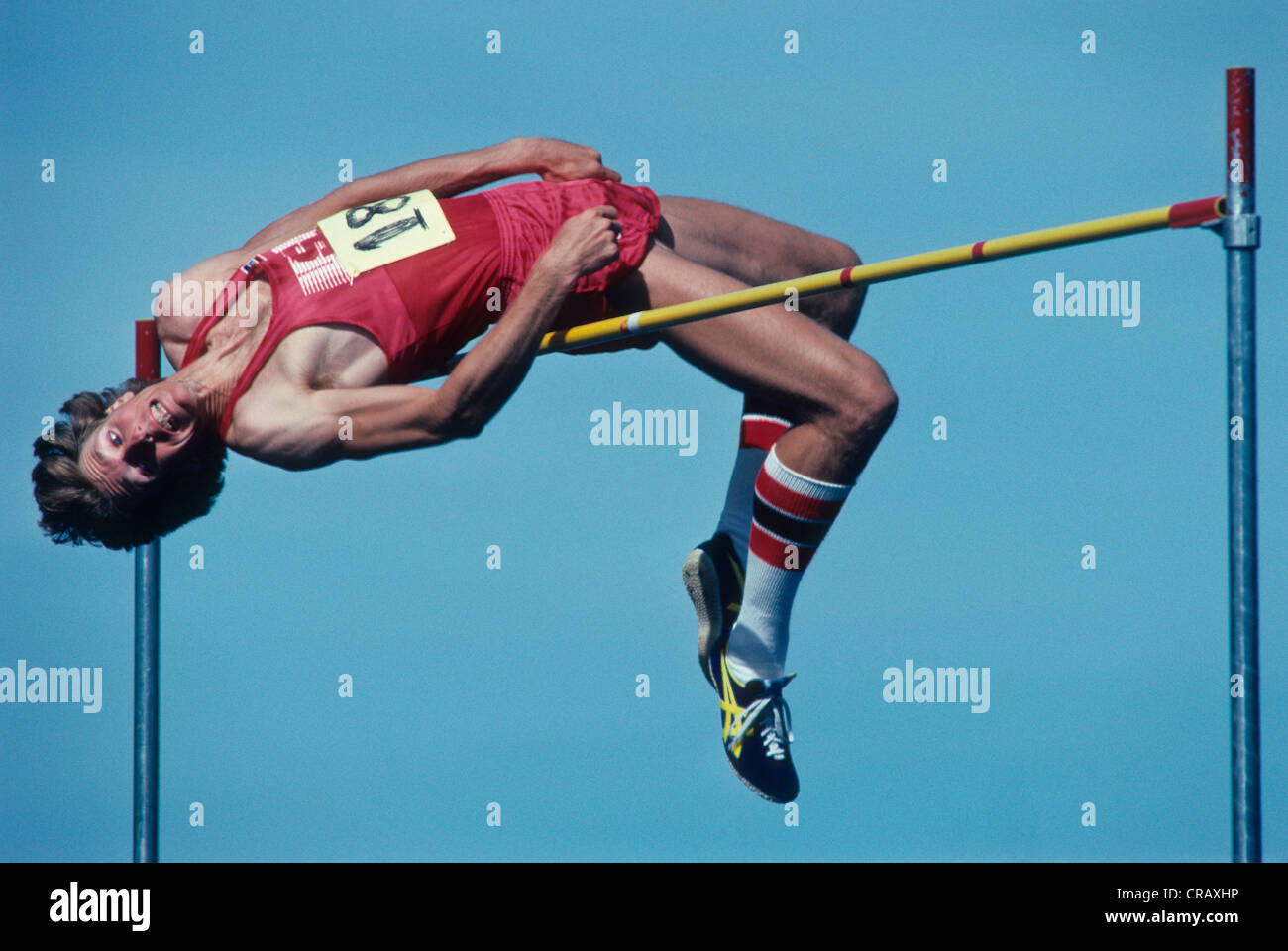 Dwight Stones competing in the high jump at the 1983 National Sports ...