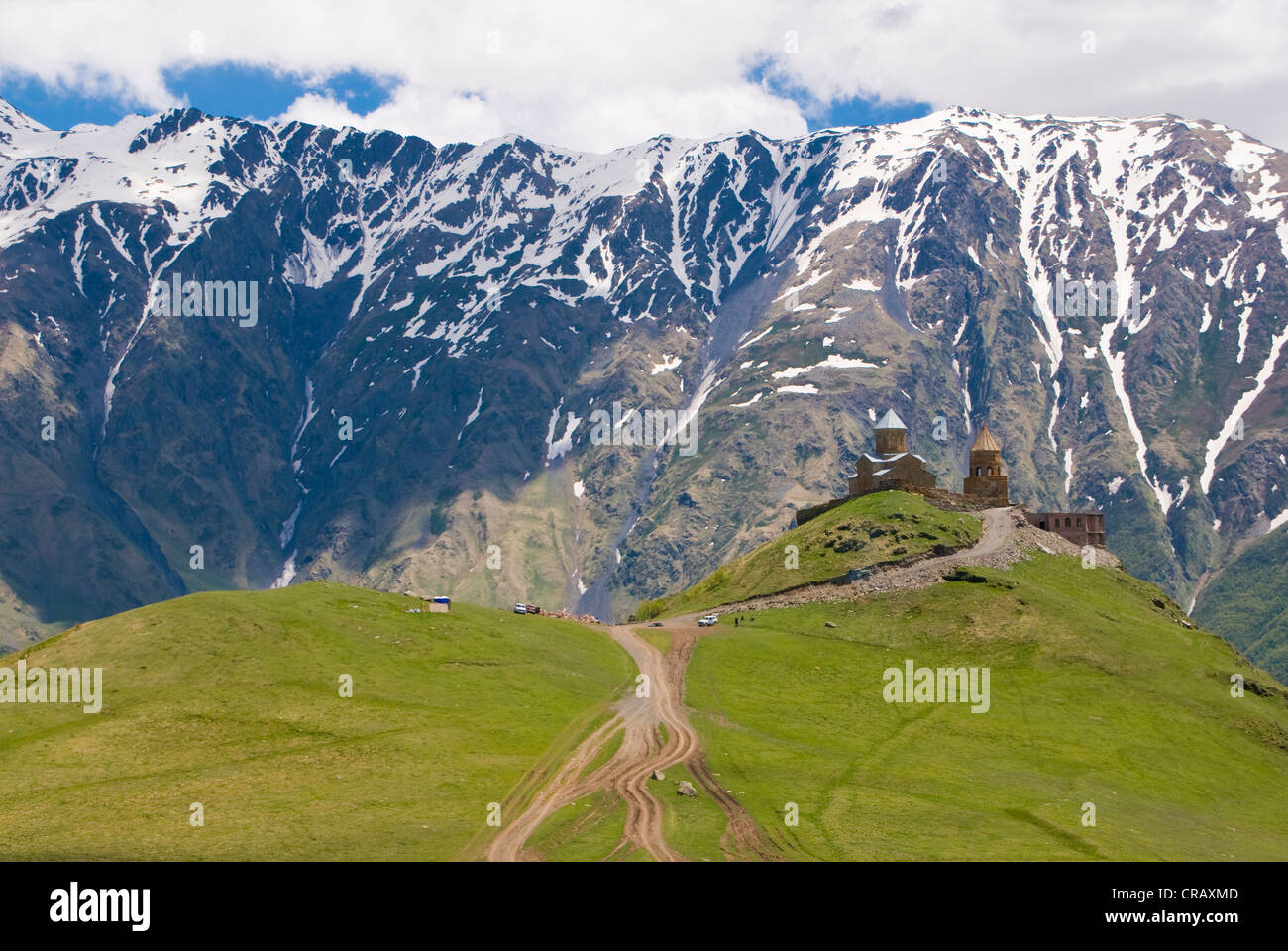 The famous Gergeti Trinity Church or Tsminda Sameba at the Chechen ...