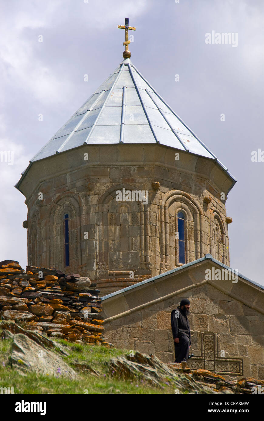 The famous Gergeti Trinity Church or Tsminda Sameba at the Chechen ...