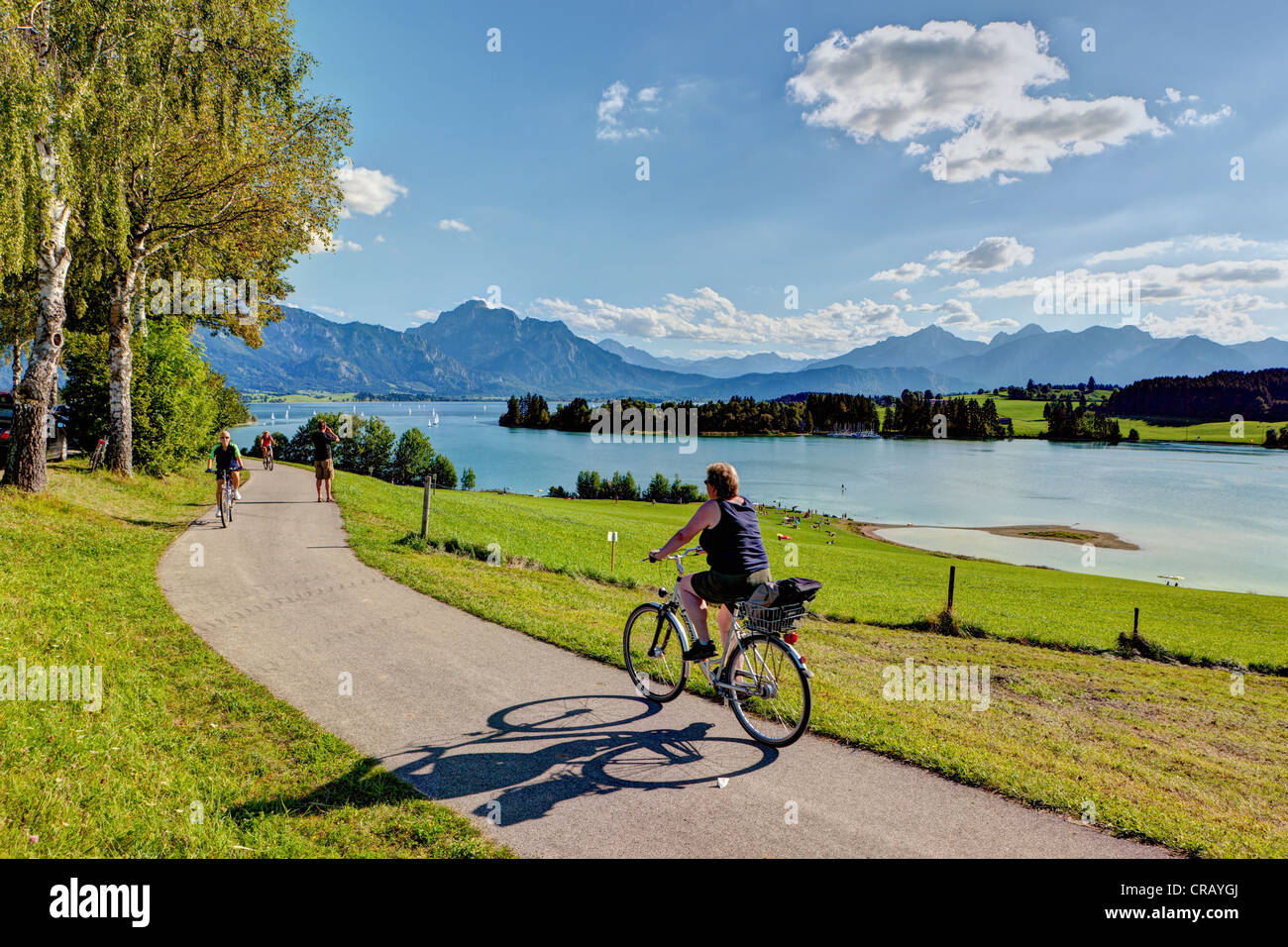 Biking at lake forggensee hi-res stock photography and images - Alamy