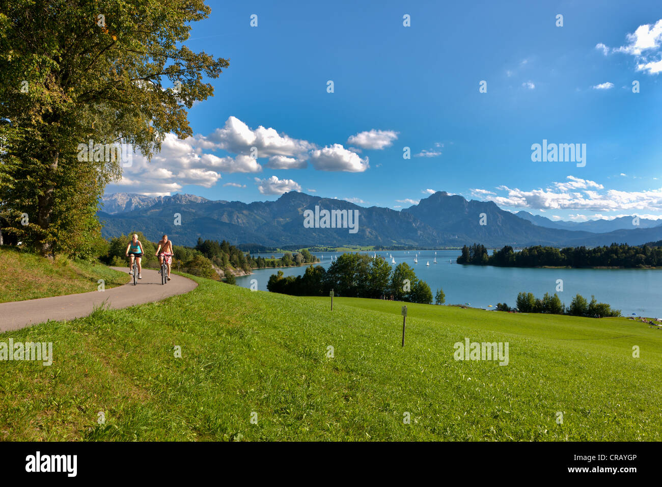Biking at lake forggensee hi-res stock photography and images - Alamy