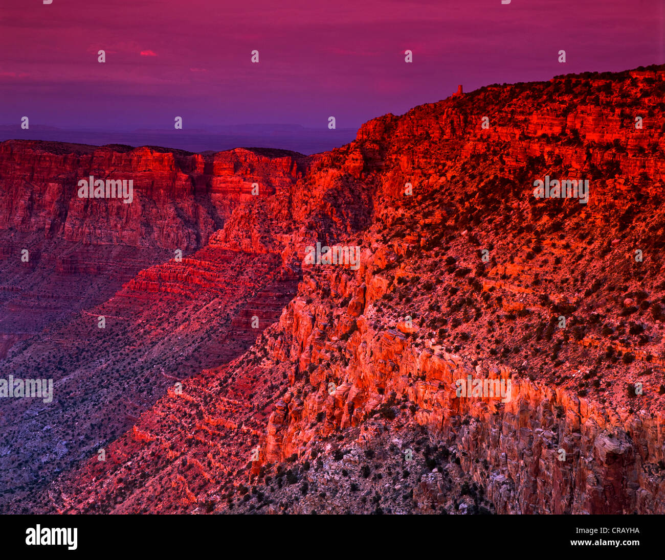 A breath taking sunset looking east at the Watchtower at Desert view ...