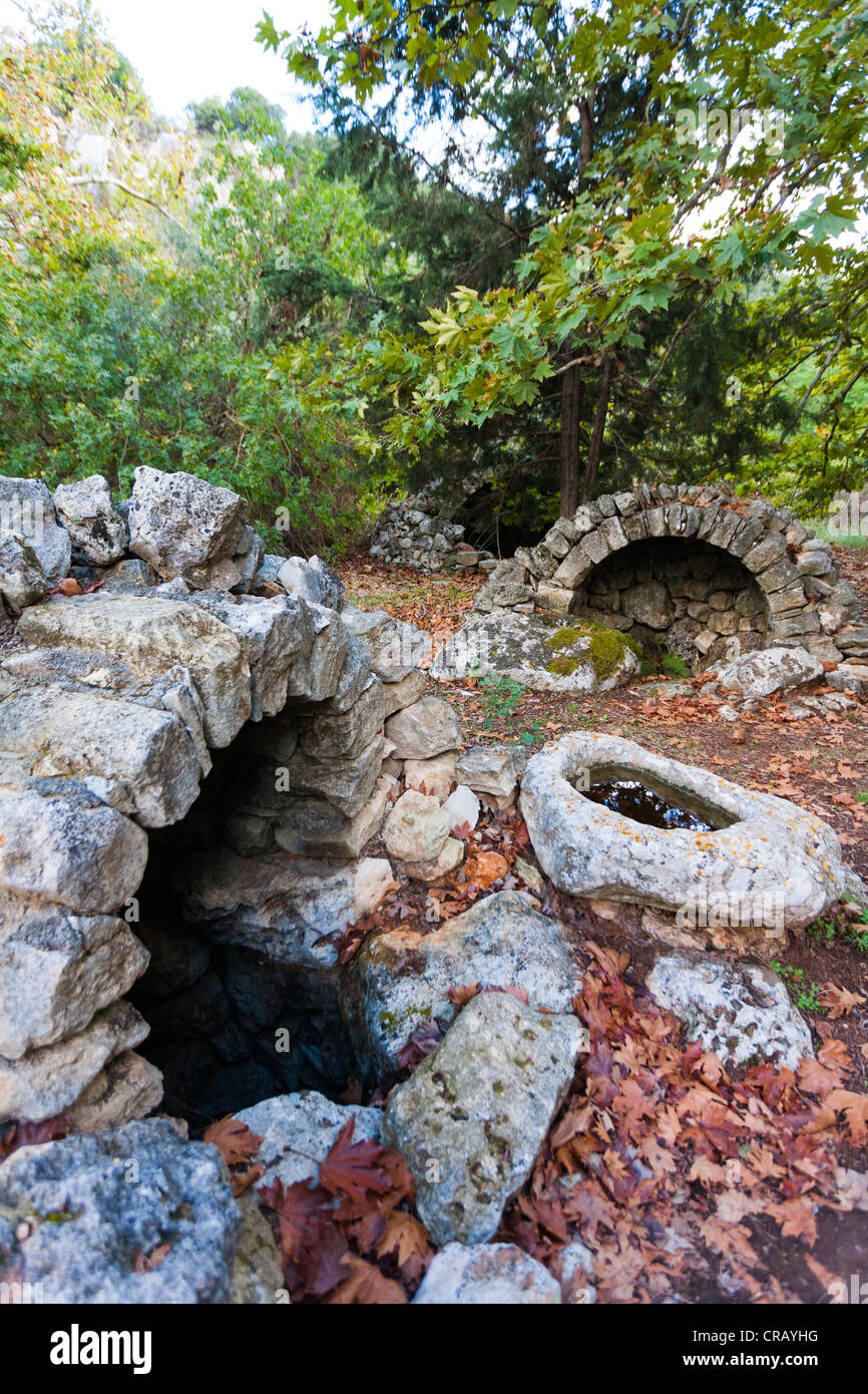 Ancient stone-built wells in the hills of Crete Stock Photo - Alamy