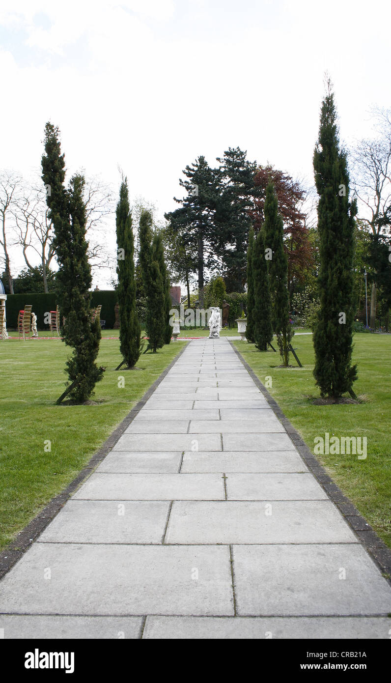 paved path leading to grecian style statue West Retford Hotel, North ...