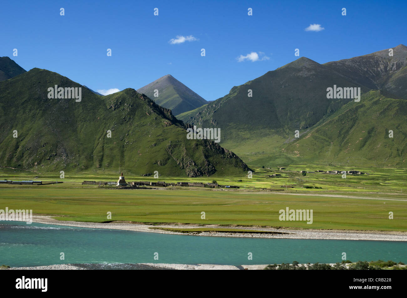 Reting river, Reting Tsangpo, with Tibetan village and stupa, chorten ...