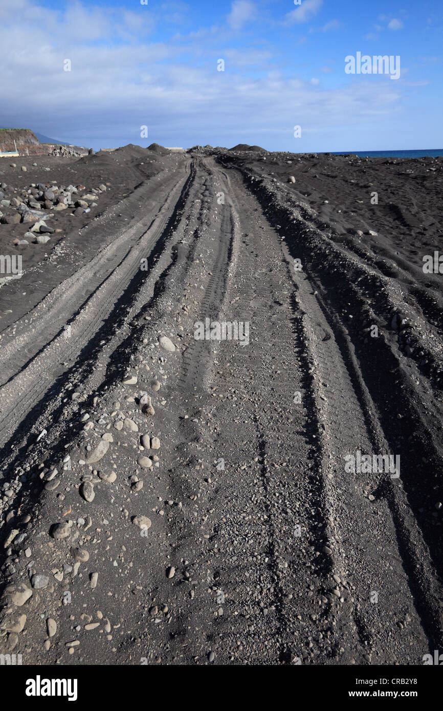 Tyre tracks on a beach with black sand, Tazacorte, La Palma, La Isla ...