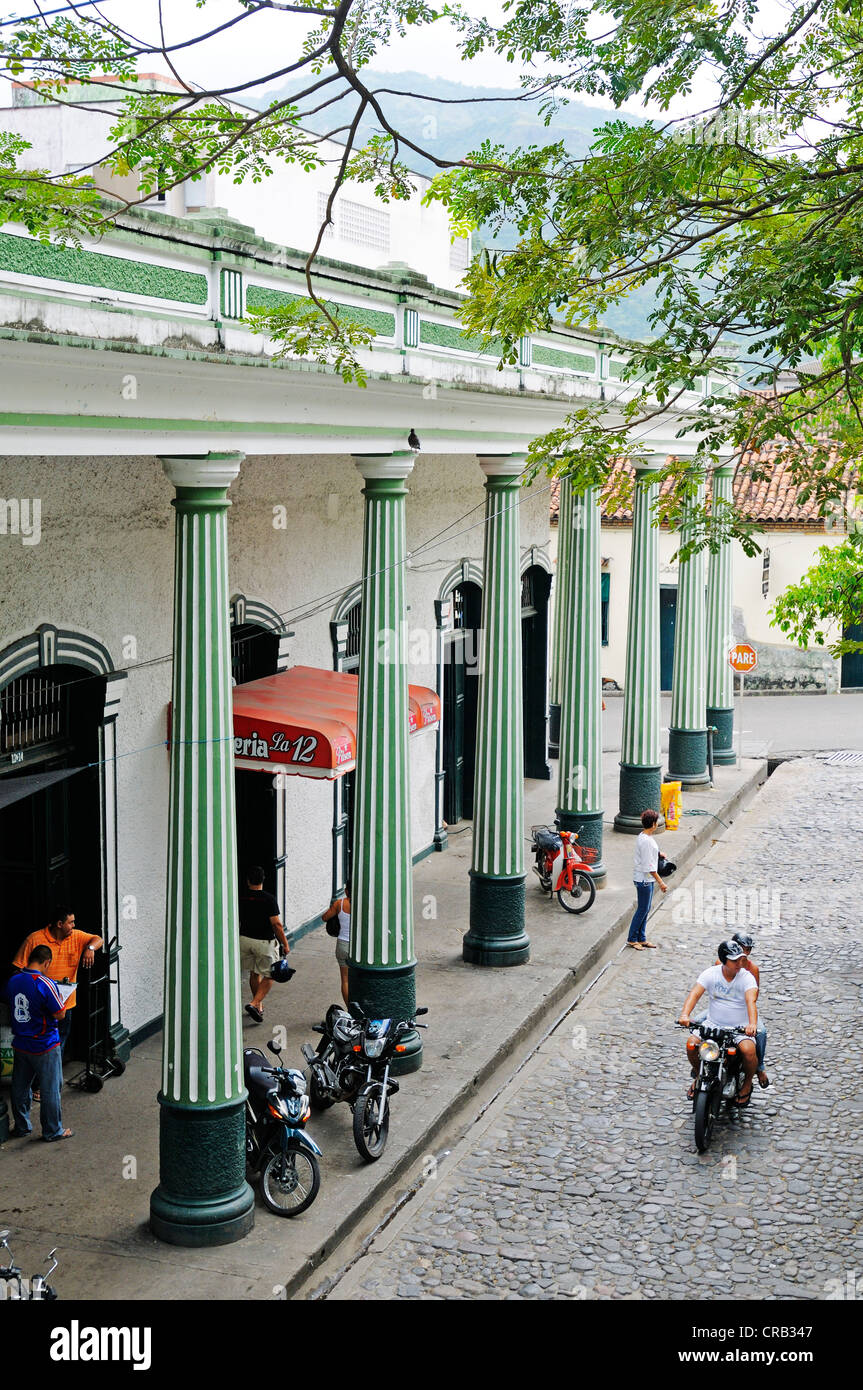 Historic market hall with columns and arcades, city of Honda, Colombia ...