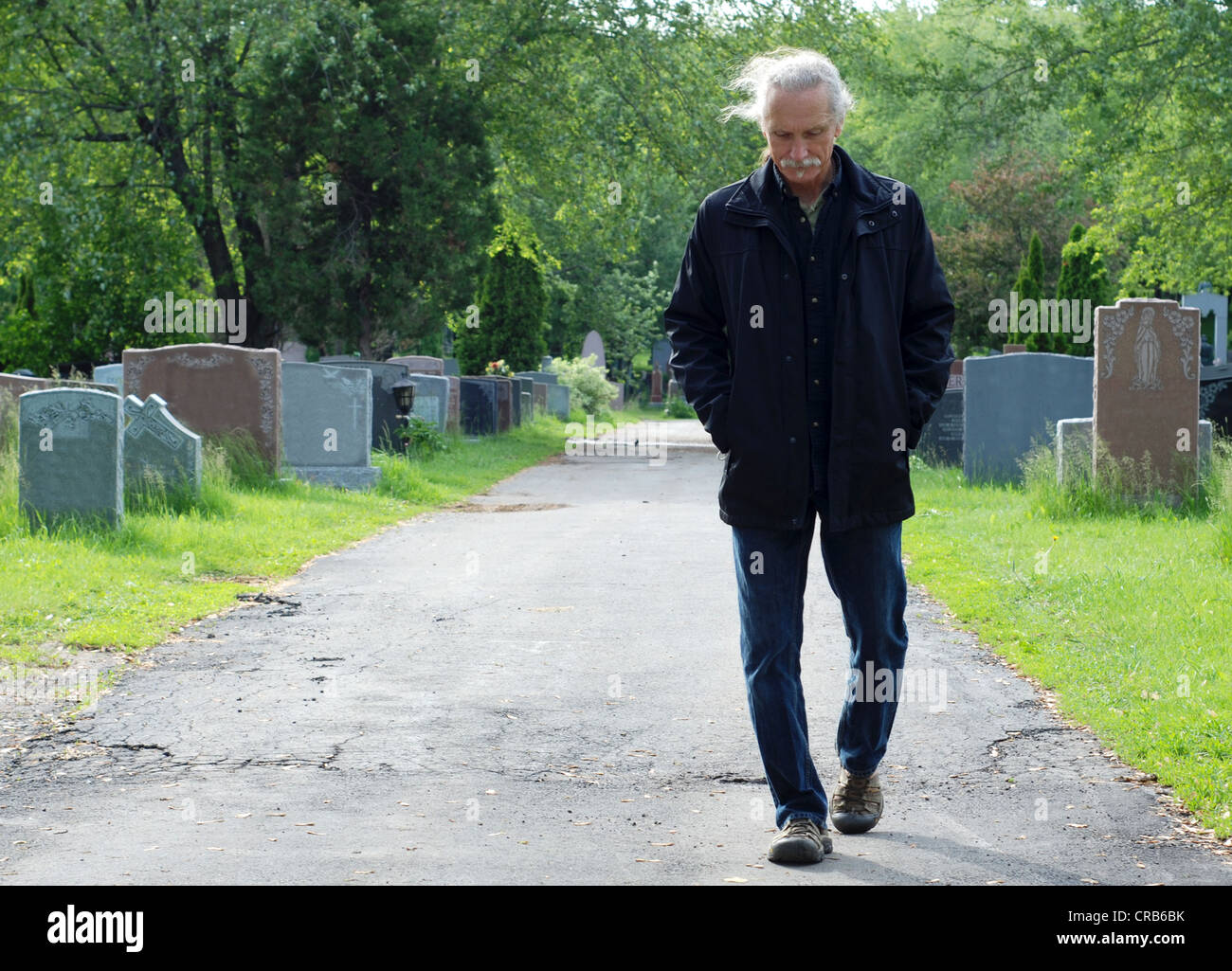 Walking in cemetery hi-res stock photography and images - Alamy