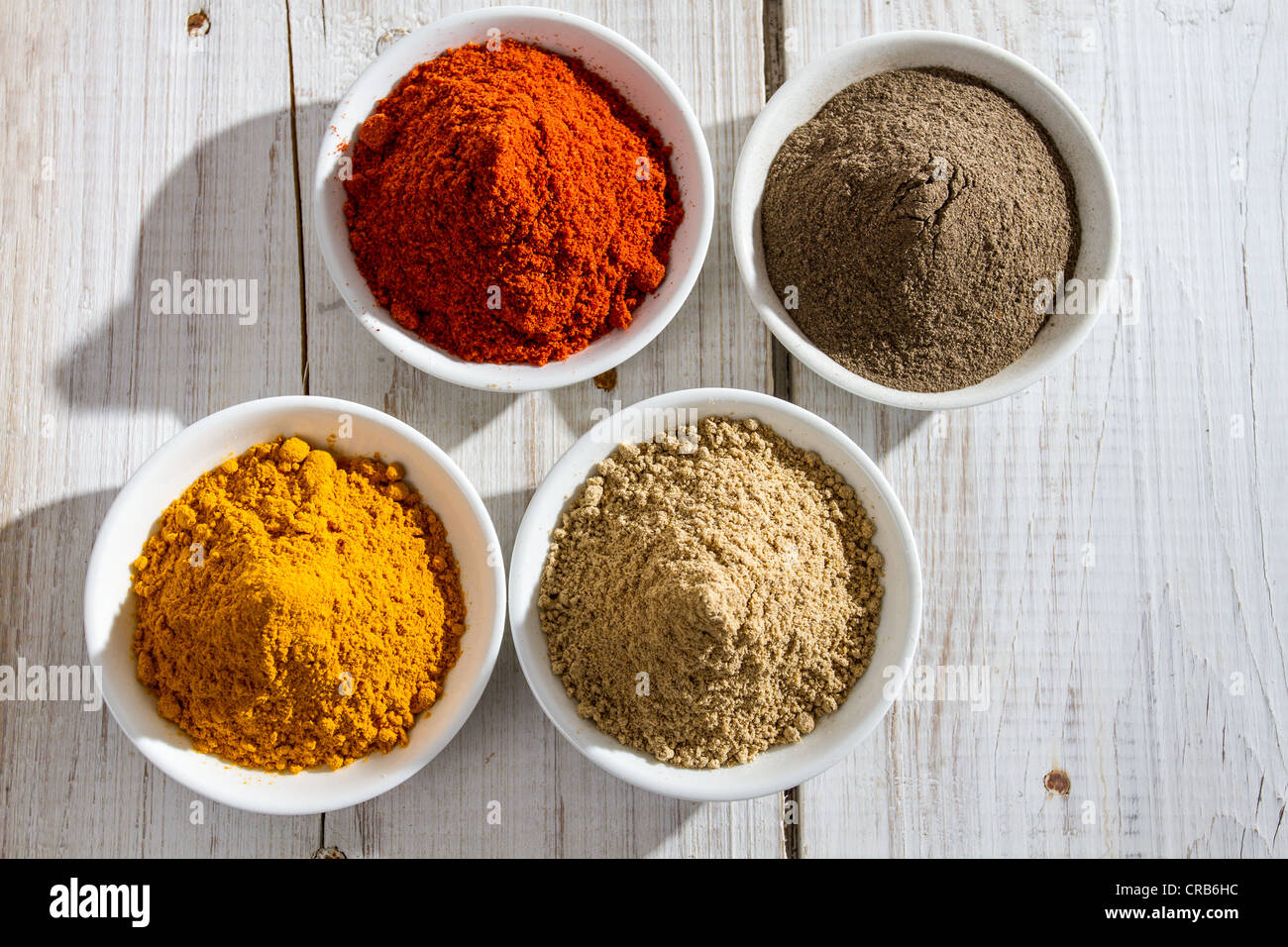 Close-up of four types of spices Stock Photo - Alamy