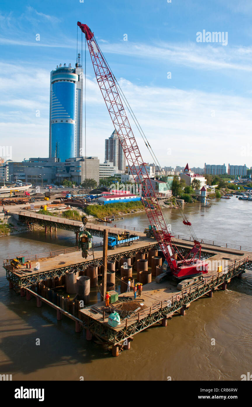 Construction site for a new bridge over the Songhua River, Harbin ...