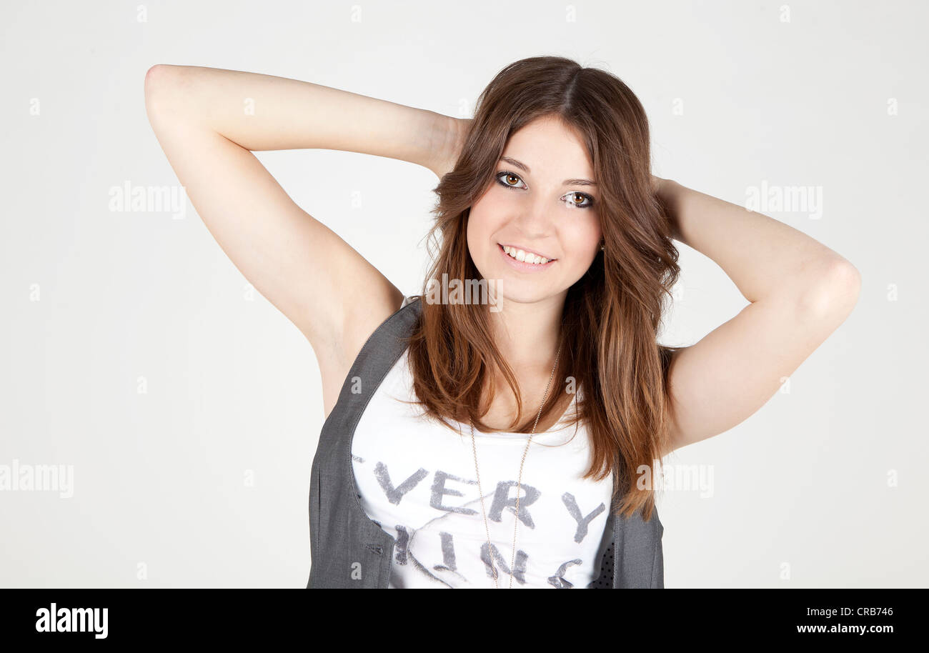 Arms crossed behind head hi-res stock photography and images - Alamy