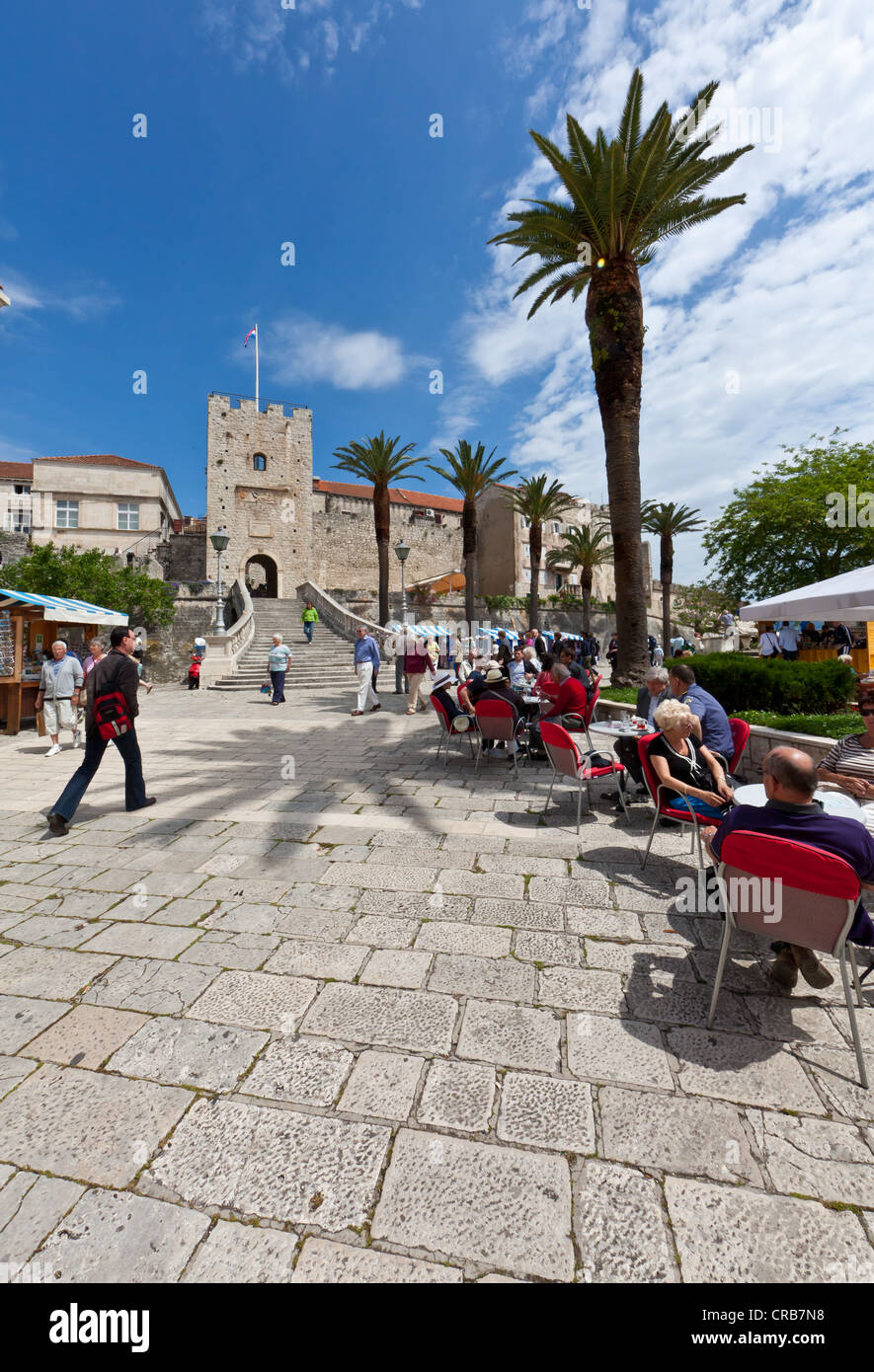 Historic centre of Korcula with tourists in front of the castle ...