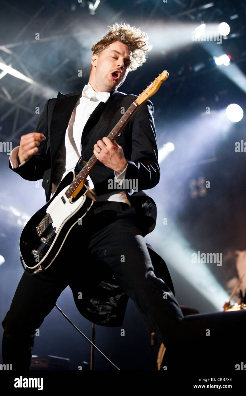 Guitarist Nicholaus Arson of the Swedish band The Hives performing live ...