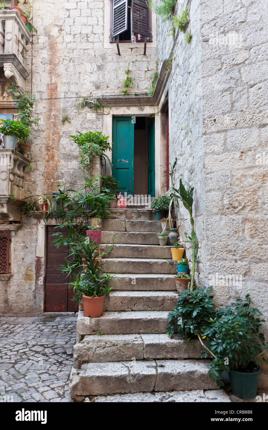 Entrance with a stone staircase, historic centre of Trogir, UNESCO ...