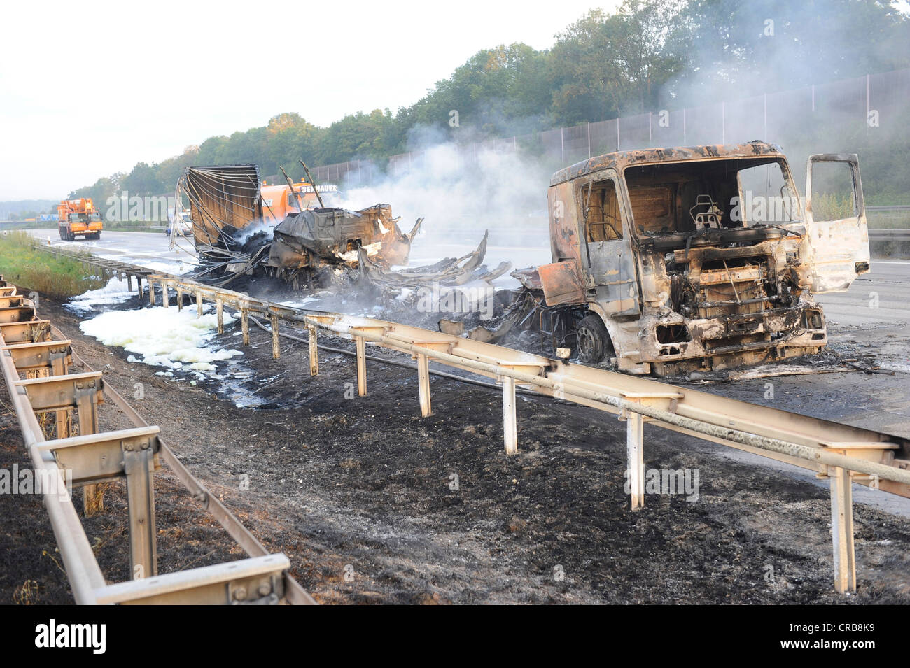 Two burnt-out trucks on the A8 motorway, Stuttgart, Baden-Wuerttemberg ...