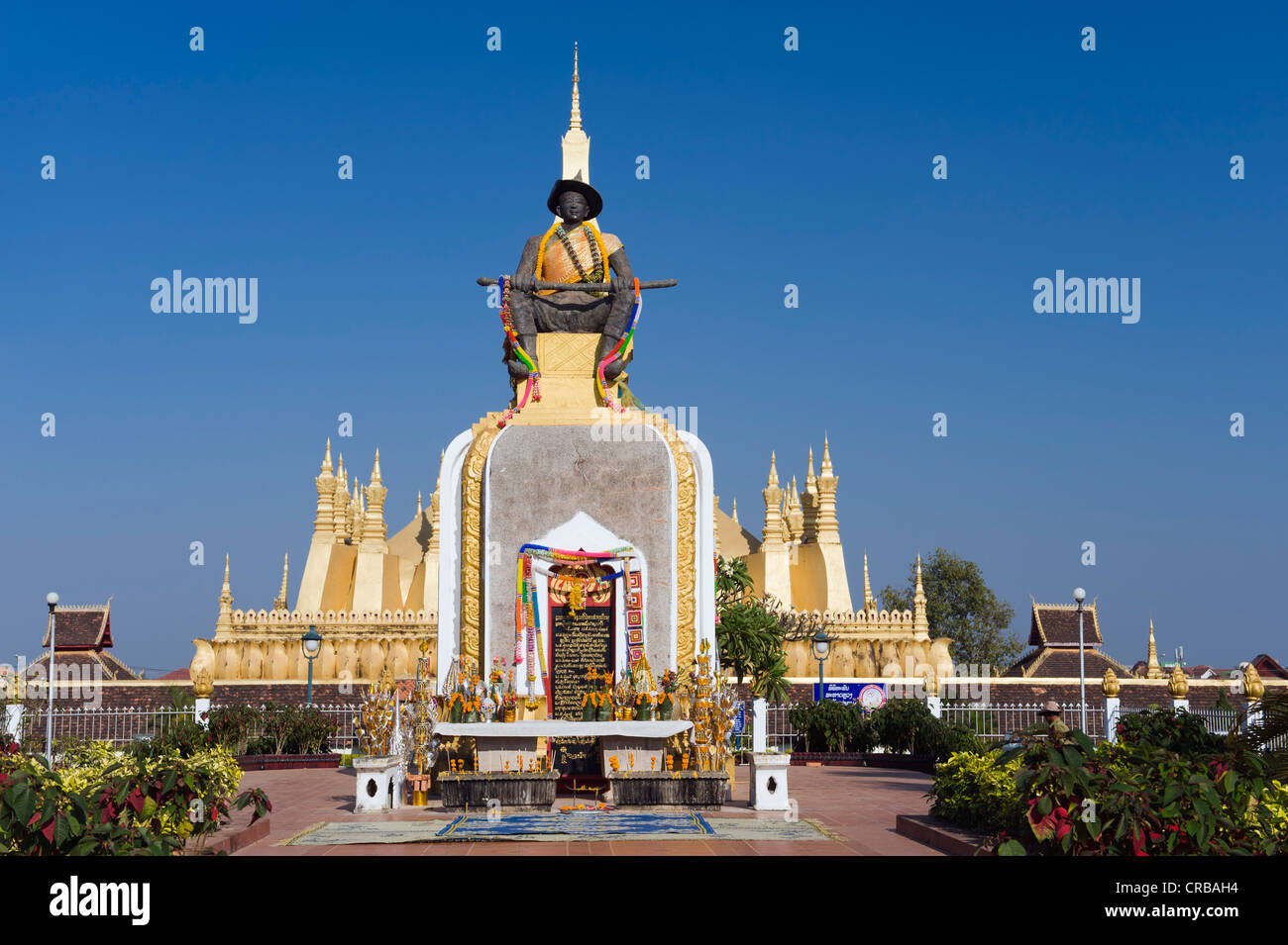 Statue of King Setthathirat at Pha That Luang temple, Vientiane, Laos ...