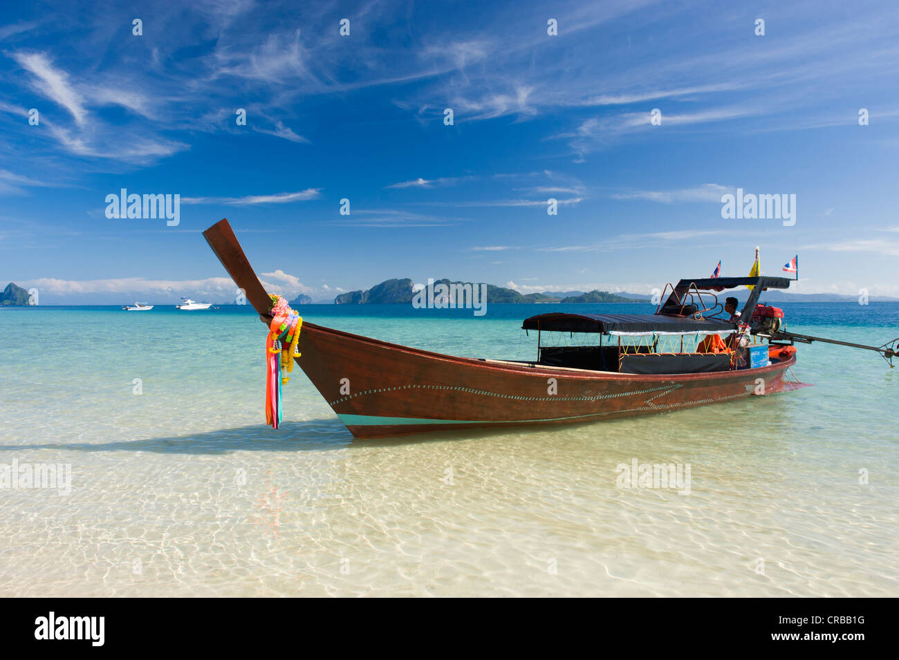 Long-tail boat on a sandy beach, Ko Kradan, Koh Kradan, Trang, Thailand ...