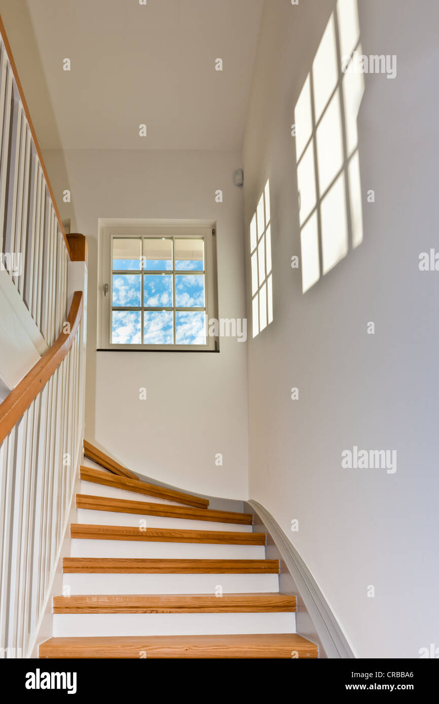Staircase with windows Stock Photo - Alamy