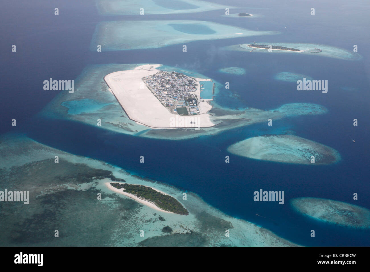Aerial view, atolls of the Maldives on the flight from Male to the ...