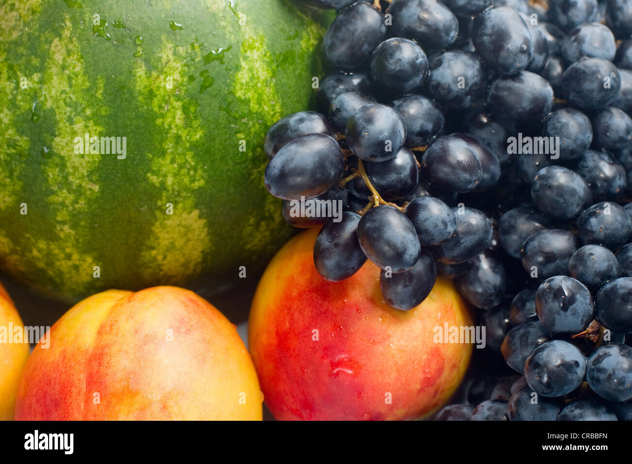 fresh fruit, watermelon, grapes and peaches Stock Photo - Alamy