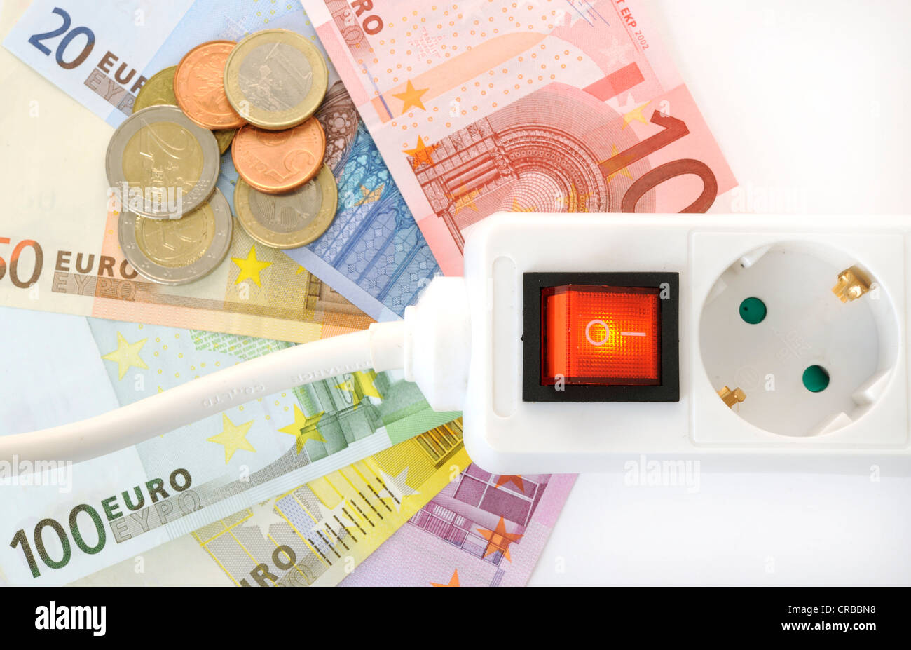 Switchable multi-plug extension lead, euro banknotes and coins ...