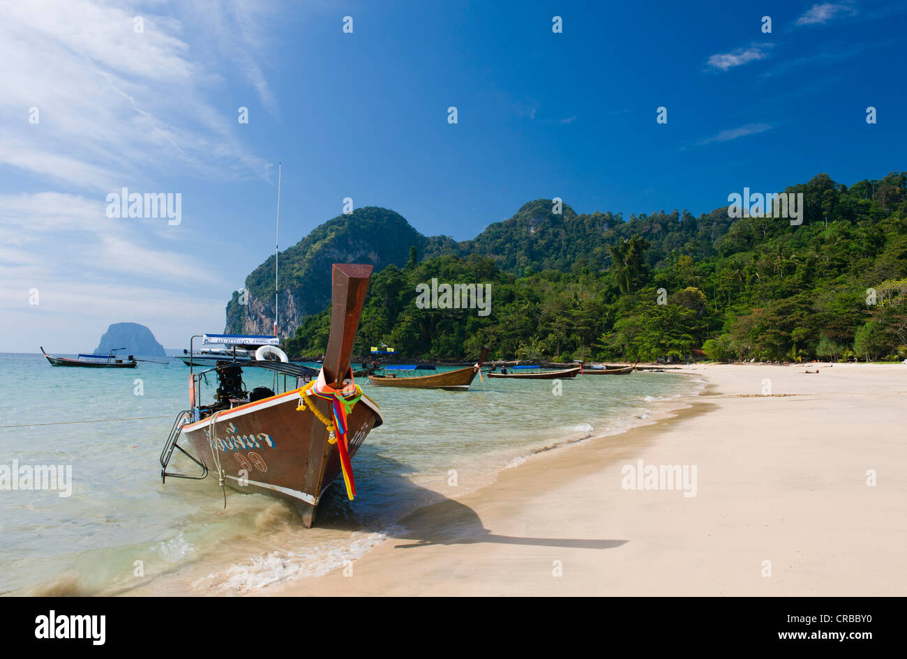 Long-tail boat on the sandy beach, Farang Beach, Ko Muk or Ko Mook ...