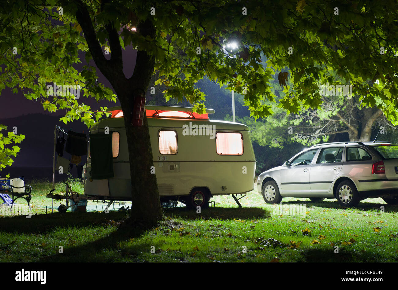 Caravan on a camping site at night, Orebic, Peljesac Peninsula ...