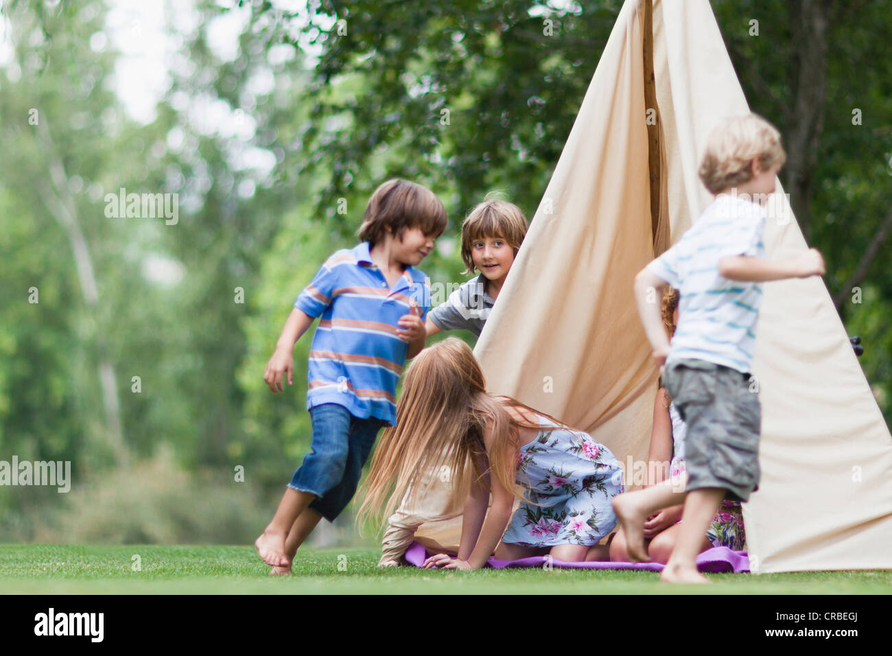 Children playing in tent outdoors Stock Photo - Alamy