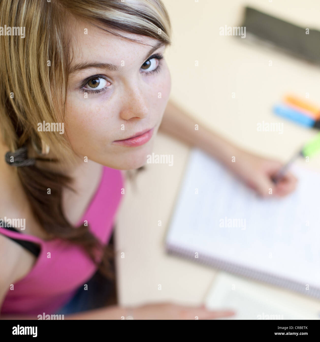 Portrait of a pretty young college student in a classroom Stock Photo ...