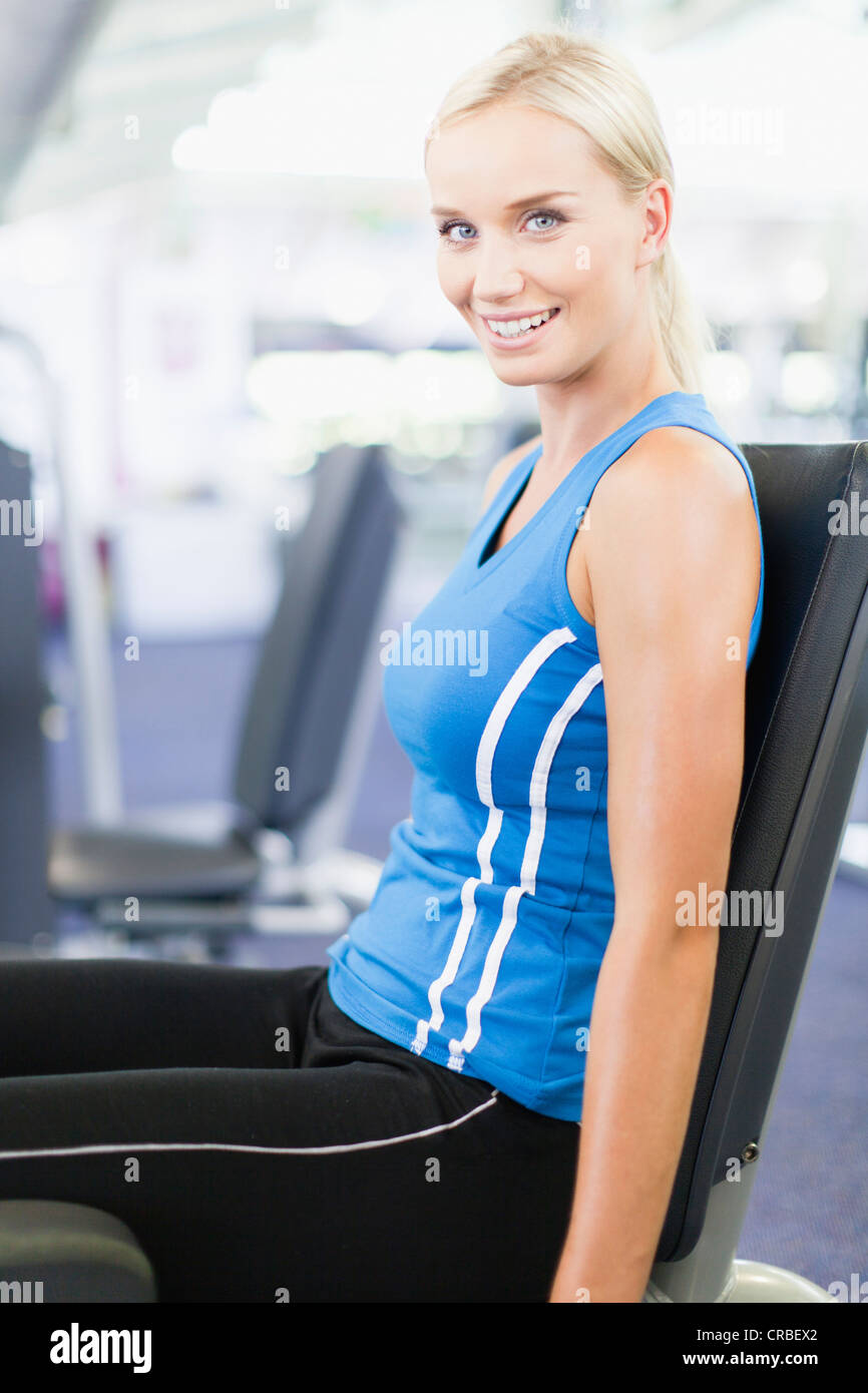 Young lady using weights hi-res stock photography and images - Alamy