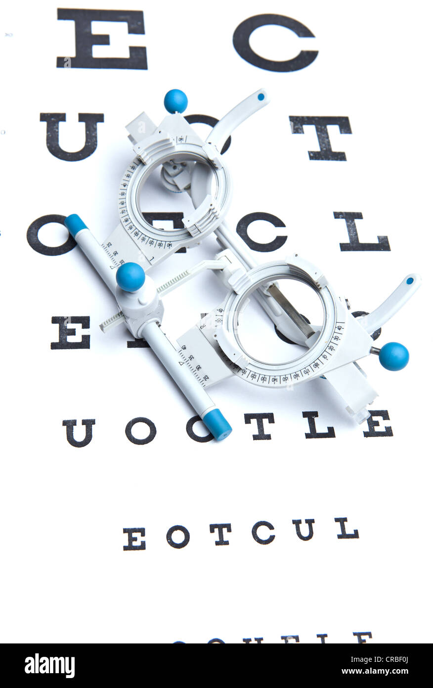 optometry concept - sight measuring spectacles & eye chart Stock Photo ...