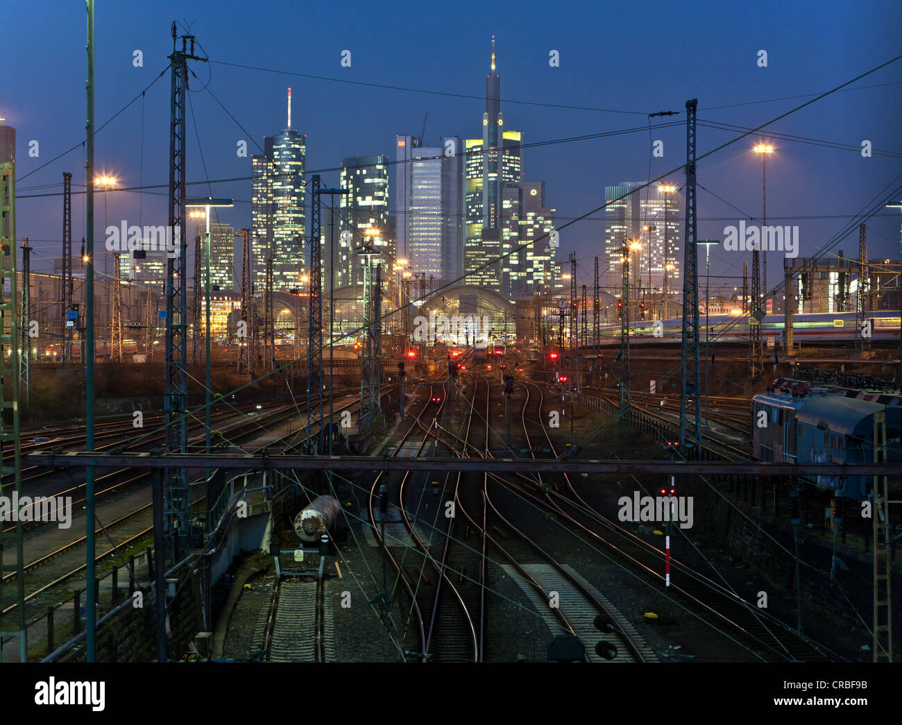 View of the main train station with a moving ICE train, behind the ...