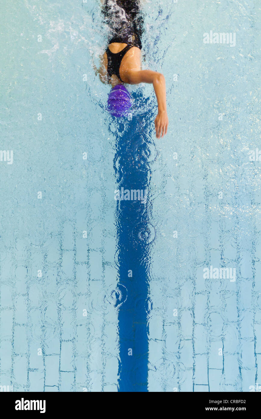 Rear view female swimmer pool hi-res stock photography and images - Alamy