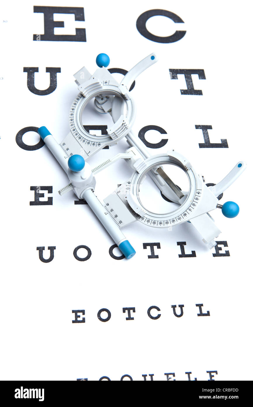 optometry concept - sight measuring spectacles & eye chart Stock Photo ...