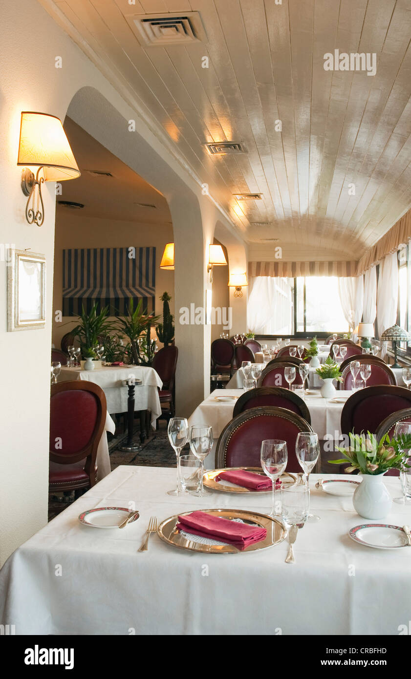 Set table in a restaurant, L'Oca Bianca, Viareggio, Tuscany, Italy ...