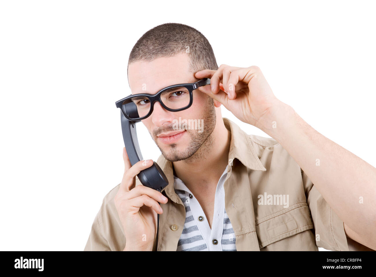young man with a phone, isolated on white Stock Photo - Alamy