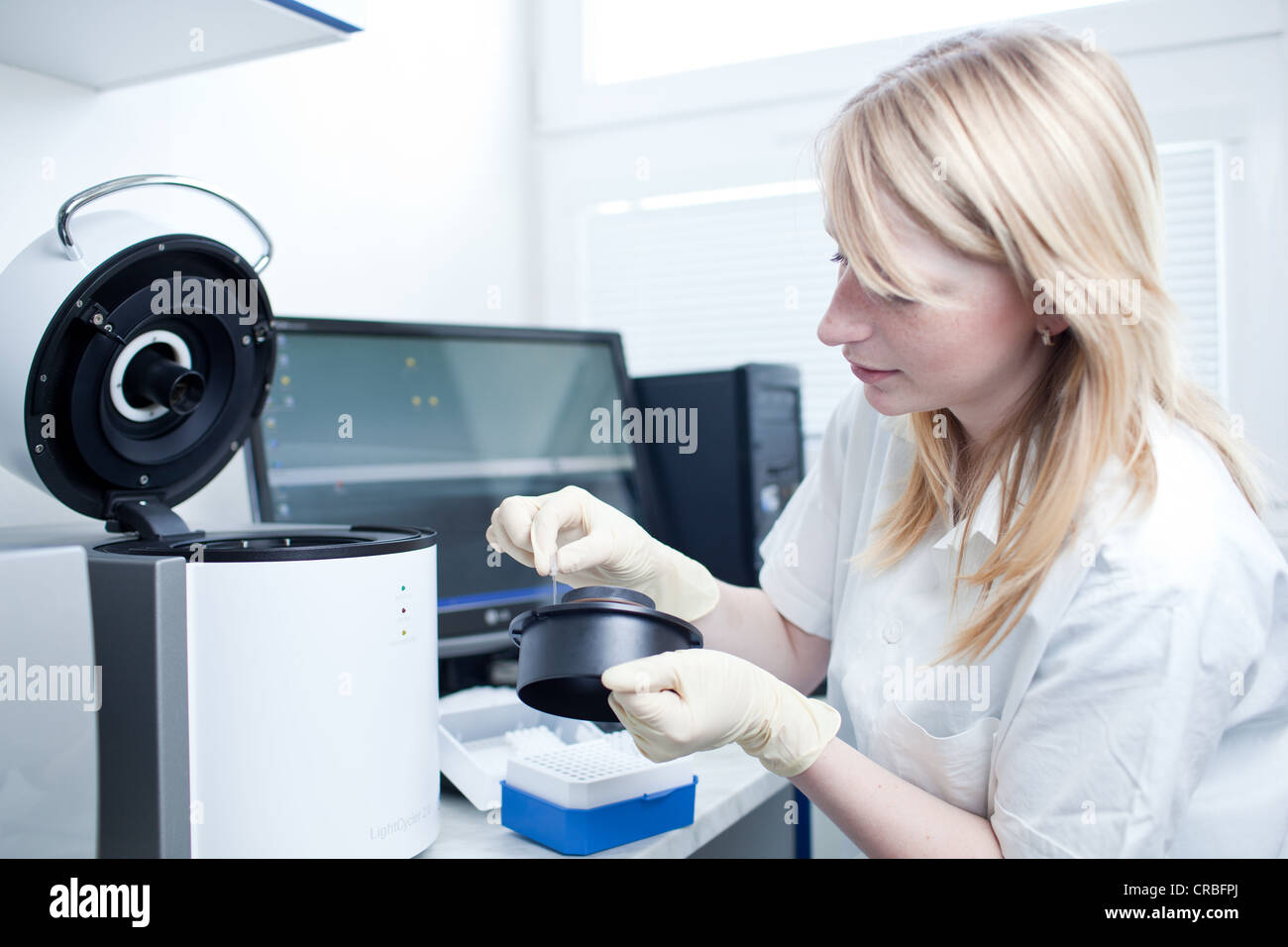 portrait of a female researcher working in a lab Stock Photo - Alamy