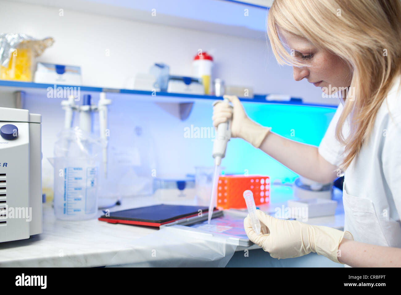 portrait of a female researcher doing research in a lab Stock Photo - Alamy
