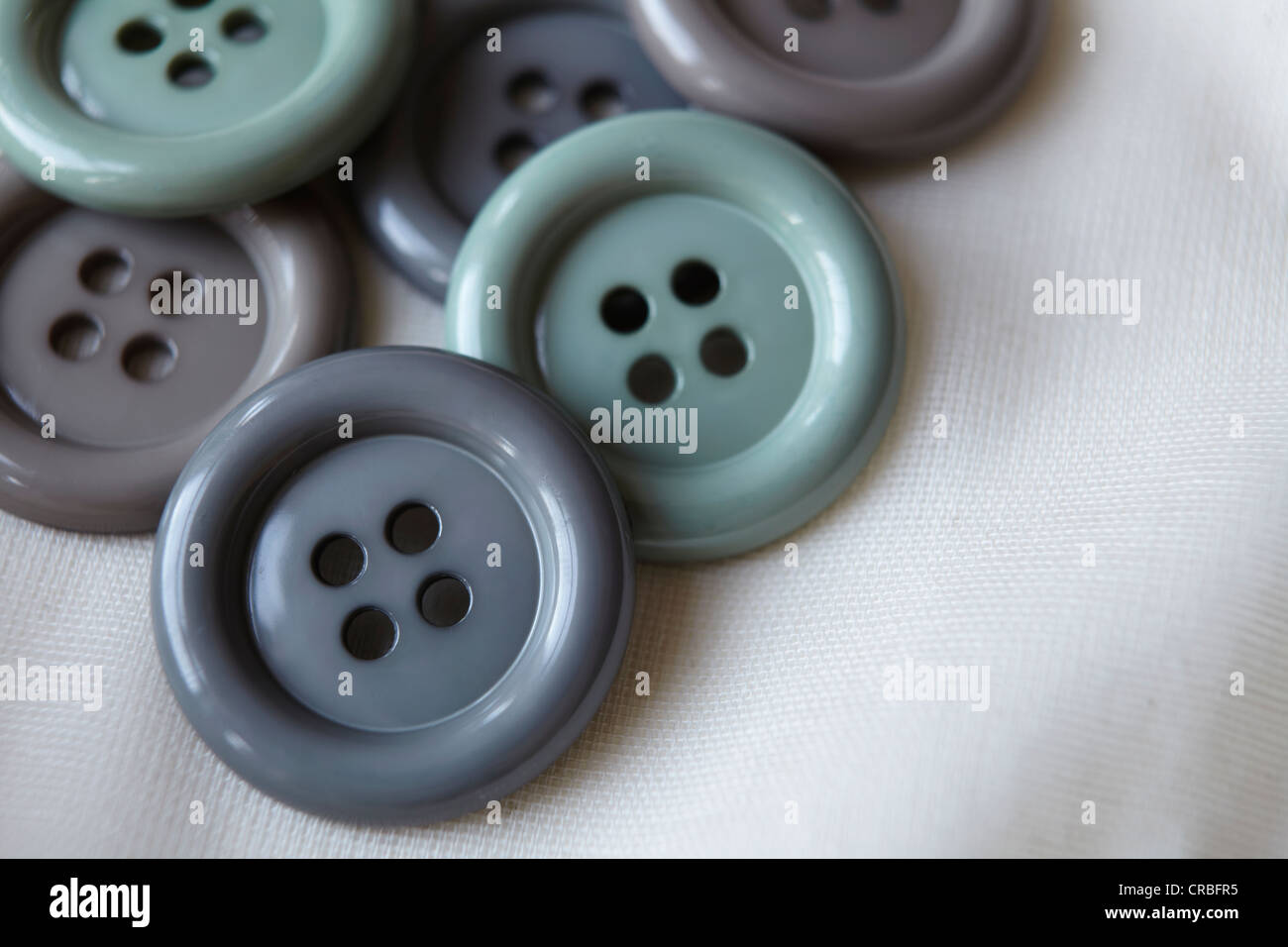 Close up of grey buttons Stock Photo - Alamy